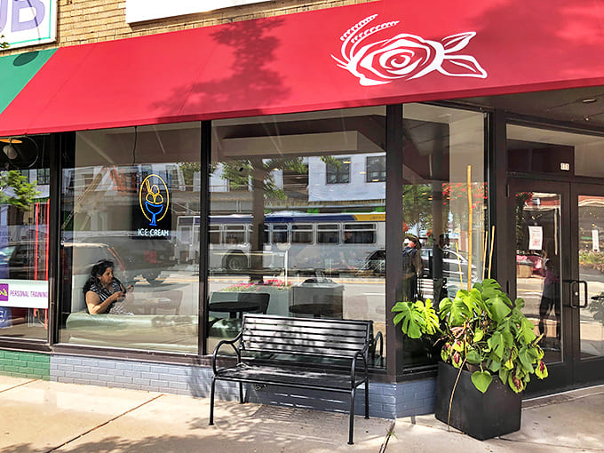 Rose Street Patisserie's elegant storefront with its striking red awning brings a touch of Parisian charm to St. Paul's Snelling Avenue.