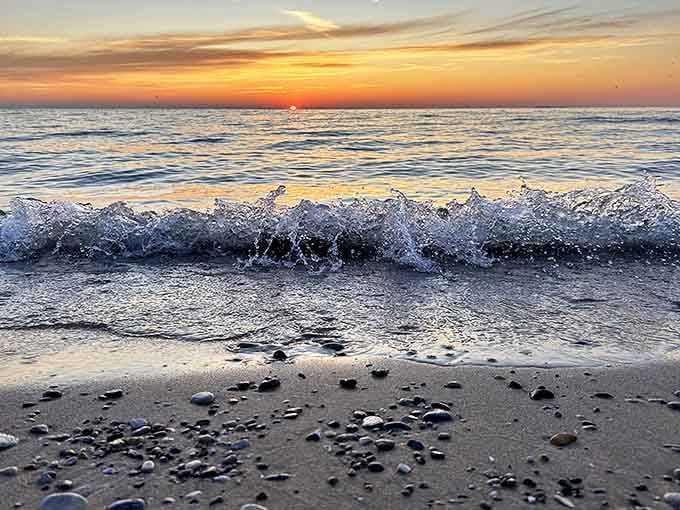 Sunset transforms Christmas Cove into a peaceful sanctuary, where the day's last light dances across the calm waters.