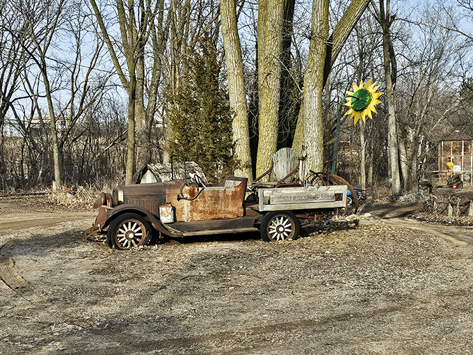 Another mechanical relic rests at Hot Sam's, its weathered body telling stories of roads traveled long ago before finding this artistic retirement home.