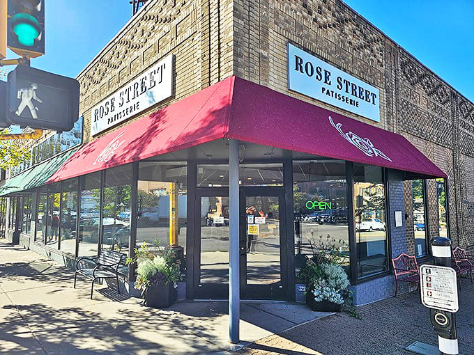 The corner location of Rose Street Patisserie catches the sunlight perfectly, highlighting the bakery's name while promising French delights inside.
