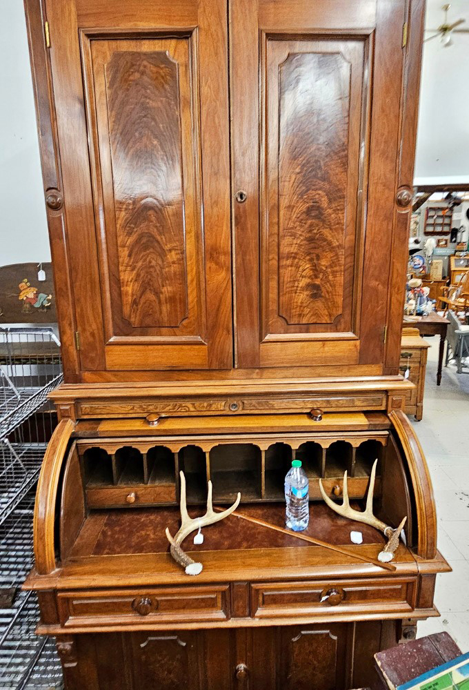 This Victorian walnut cylinder secretary desk isn't just furniture &ndash; it's a magnificent wooden time capsule where someone once penned letters instead of sending "u up?" texts.
