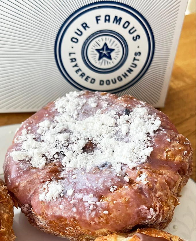 The Blueberry Hill doughnut &ndash; where fruit meets indulgence in a powdered sugar snowfall that makes every bite taste like summer memories.
