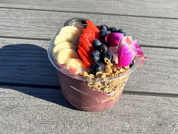 This Brazilian Moose smoothie bowl is a work of art – açaí base topped with fresh fruit, granola, and edible flowers.