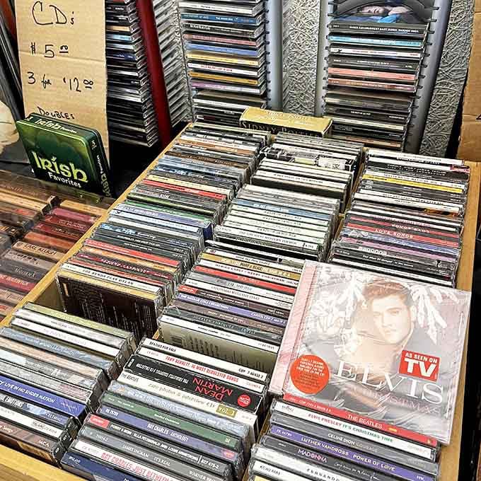 Musical time capsules stacked neatly in rows. Each CD holds not just songs, but the soundtrack to someone's most important memories.