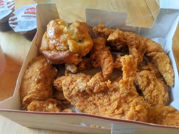 The Cajun tenders deliver a spice-forward punch that dances on your tongue, while that honey biscuit provides the perfect sweet counterpoint.