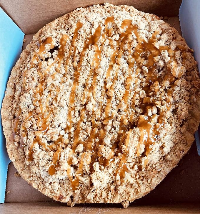 This isn't just apple pie &ndash; it's Caramel Apple Crunch, where buttery streusel topping meets tender fruit, all drizzled with caramel that cascades like an autumn waterfall.