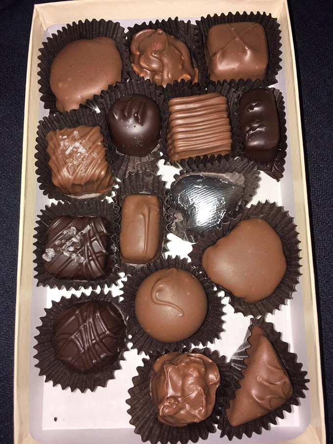 Chocolate lovers, rejoice! This elegant assortment of handcrafted chocolates proves that sometimes the best things come in small, glossy packages.