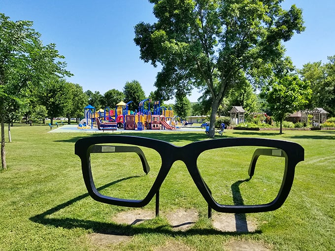 Through these frames, childhood returns: Giant spectacles at the park offer whimsical views of playgrounds where imagination runs wild.