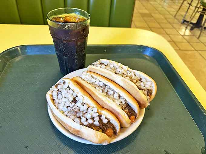 Two perfectly dressed Coney dogs with diced onions and a cold soda – the lunch that launched a thousand Duluth workdays.