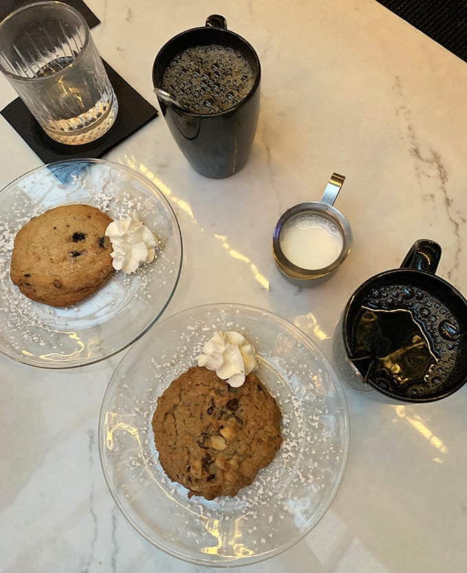 Chocolate chip cookies paired with dark roasted coffee create the kind of simple perfection that makes you wonder why anyone complicates dessert beyond this.