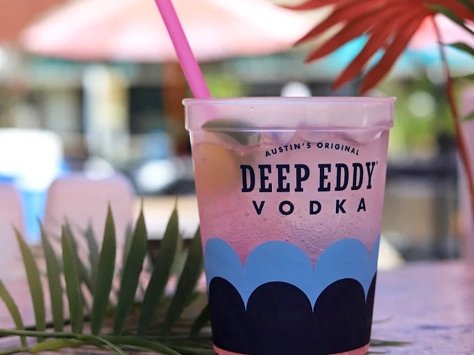 This isn't just a pink drink; it's summer captured in a plastic cup, complete with the promise that responsibilities can wait until tomorrow.