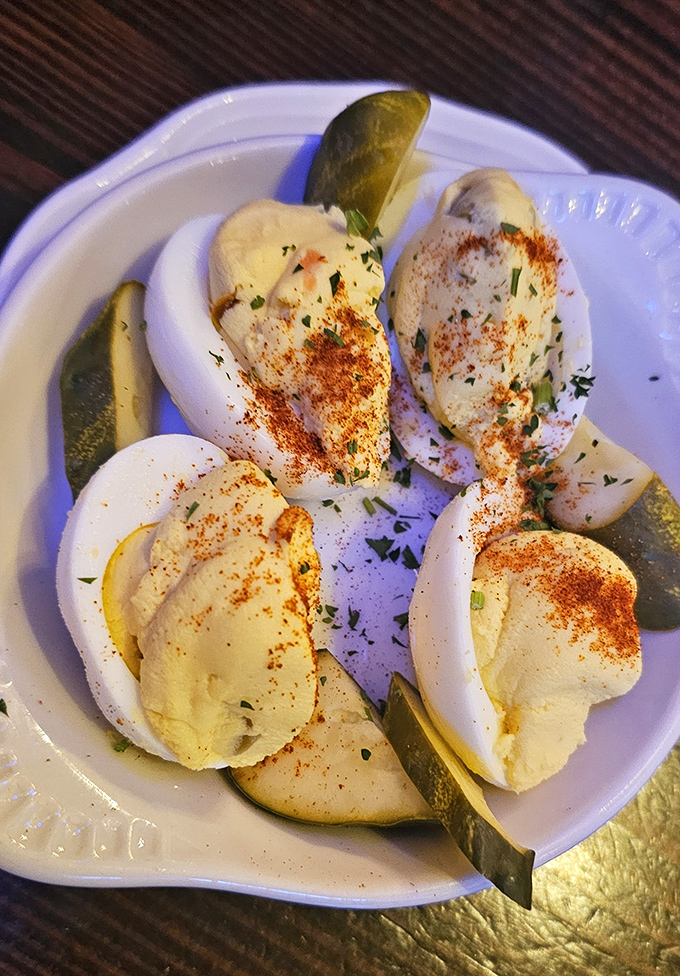 Deviled eggs sprinkled with paprika and herbs – a simple pleasure executed perfectly, proving sometimes the classics need no improvement.