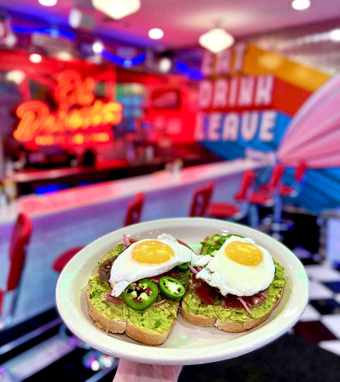 Avocado toast gets the '50s diner treatment, proving that some trends transcend time and look fabulous doing it.