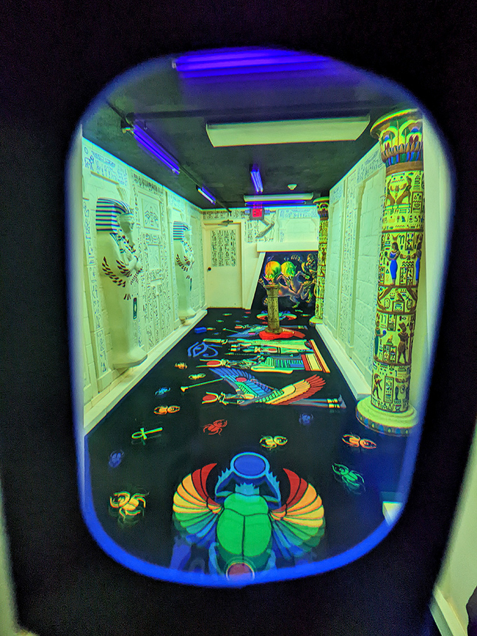 Ancient aliens built the pyramids? This Egyptian-themed hole combines archaeology with extraterrestrial lore under the eerie glow of blacklight hieroglyphics.