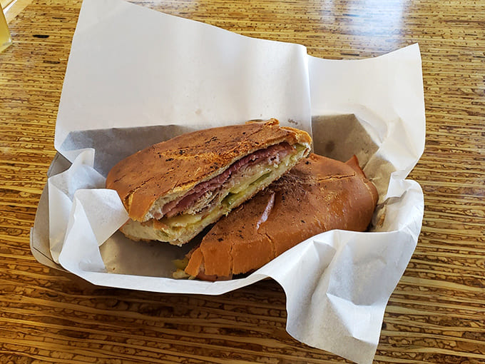 This isn't just lunch, it's a vacation between bread – pressed to perfection with layers of flavor that transport you straight to Havana.