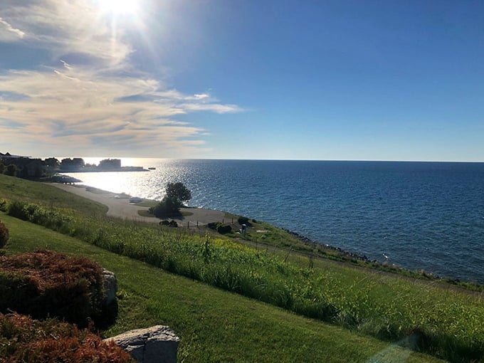 From this elevated vantage point, Lake Michigan stretches to infinity, its waters shifting between turquoise and navy like a mood ring.