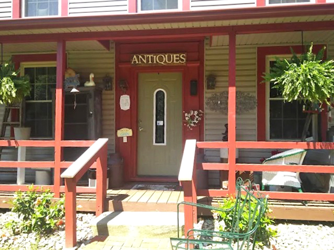Simple yet inviting, the antique shop entrance beckons with its understated charm and promise of discoveries beyond the threshold.