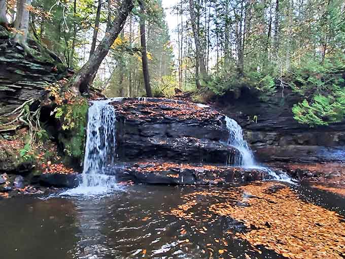 This isn't just any waterfall &ndash; it's nature's stress relief therapy in action, washing away worries with each hypnotic cascade over ancient stone.