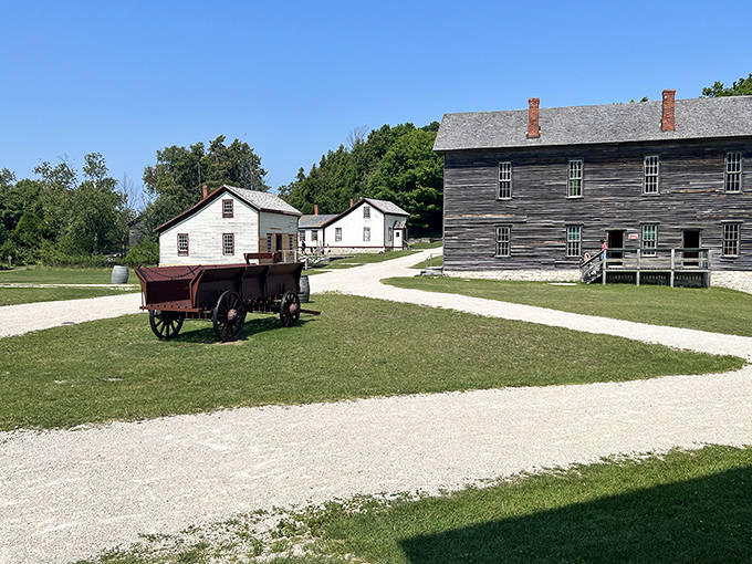 Sunlight plays across abandoned doorways, inviting modern explorers to step back into Michigan's industrial past.