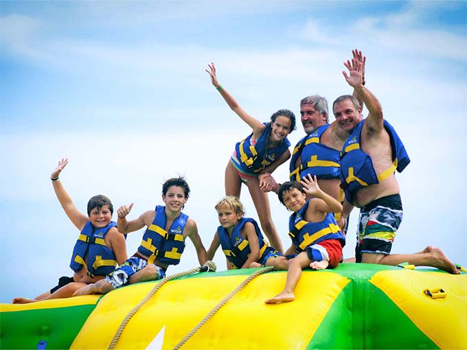 Waving hello from the water park! Nothing beats family and friends enjoying a fun, sunny day in Aqua Adventures.