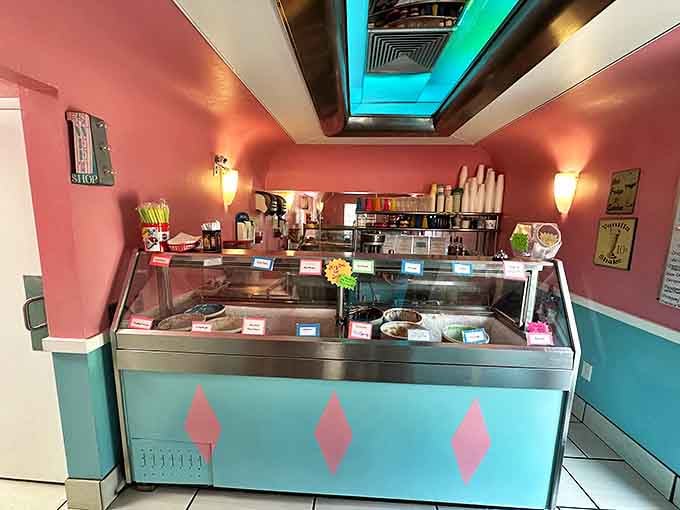 The ice cream counter stands ready for action, a pastel-hued command center where milkshake dreams become glorious reality.