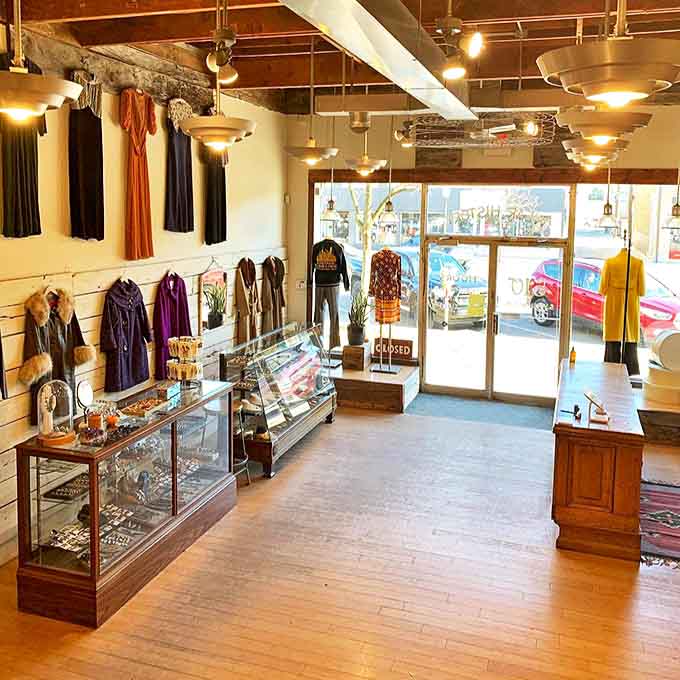 Warm wooden floors, exposed beams, and thoughtfully arranged merchandise create a museum-like quality that invites exploration rather than mere shopping.