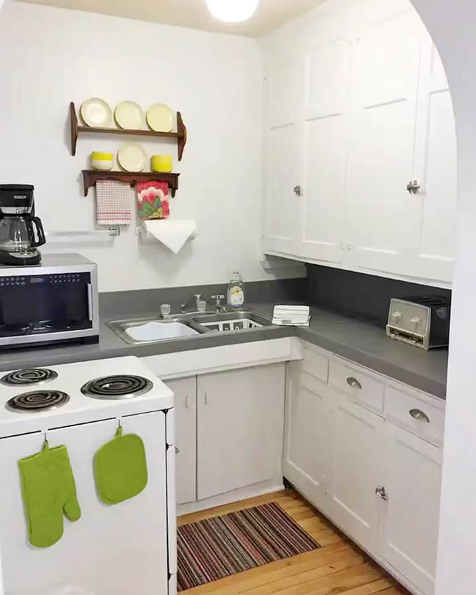 This kitchen might be compact, but it's ready for everything from midnight snacks to royal feasts – no jousting for counter space required.