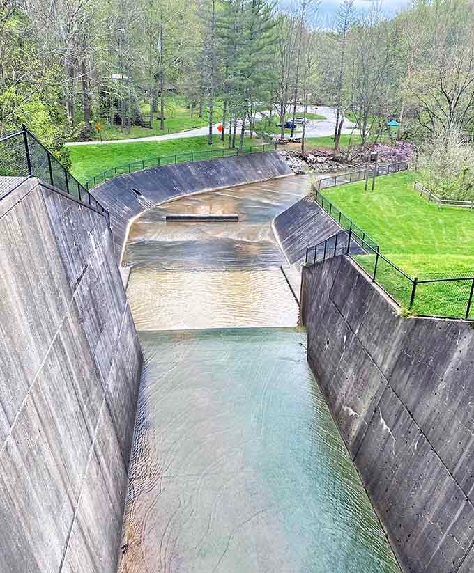 Engineering meets nature at the dam spillway &ndash; concrete precision channeling wild waters in a dance as old as civilization itself.