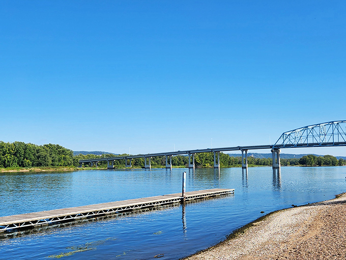 The mighty Mississippi flows past Wabasha with quiet dignity, its waters carrying centuries of stories beneath the watchful gaze of limestone bluffs.