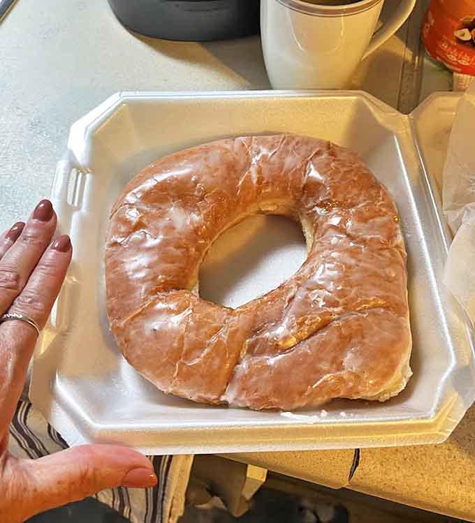 This glazed masterpiece isn't just a donut, it's an edible time machine to when things were simpler and somehow sweeter.