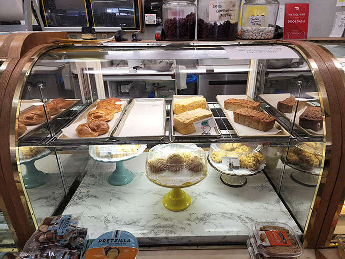 This glass case doesn't just hold baked goods &ndash; it cradles dreams made of butter, sugar, and flour, each one more tempting than the last.