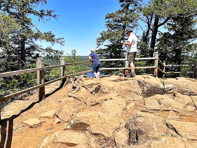 Two visitors take in the panoramic view, probably wondering if they've accidentally wandered onto a movie set. Minnesota doesn't mess around!