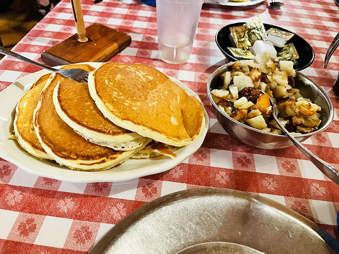 Golden pancakes that would make Paul himself proud, paired with camp-fried potatoes that put home cooking to shame.