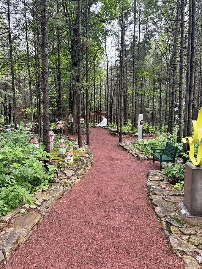 Winding paths through towering pines lead visitors to unexpected artistic treasures &ndash; each turn a new discovery waiting.