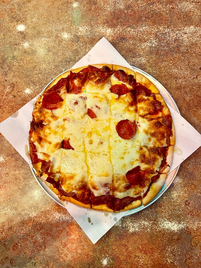 Pepperoni perfection &ndash; those crispy-edged circles aren't just toppings, they're little flavor explosions waiting to happen.