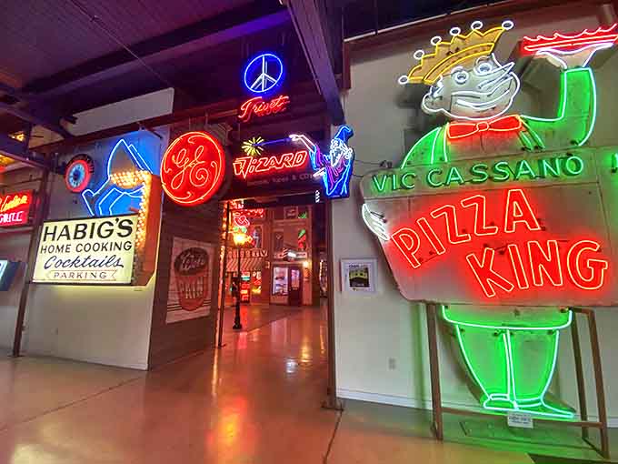 His Neon Majesty presides over his cheesy kingdom with illuminated splendor, a crowned reminder of local pizzerias before chains ruled all.
