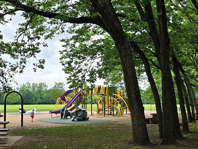 The playground ensures that kids can burn energy while parents contemplate the roses, a brilliant bit of planning that makes everyone happy.