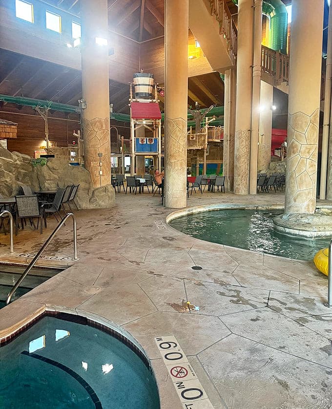 Tranquility meets excitement as hot tubs and seating areas provide perfect vantage points for parents pretending they're "just resting" while secretly enjoying the show.