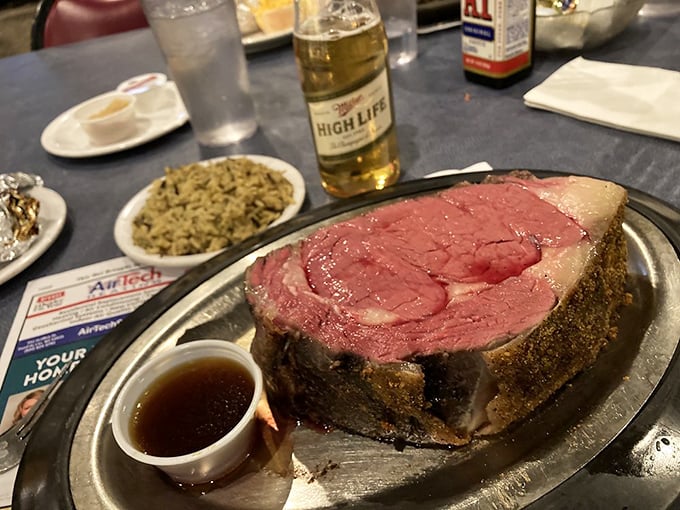 A prime rib that would make meat lovers weep with joy, perfectly seasoned and served with savory au jus for dipping each tender, juicy bite.