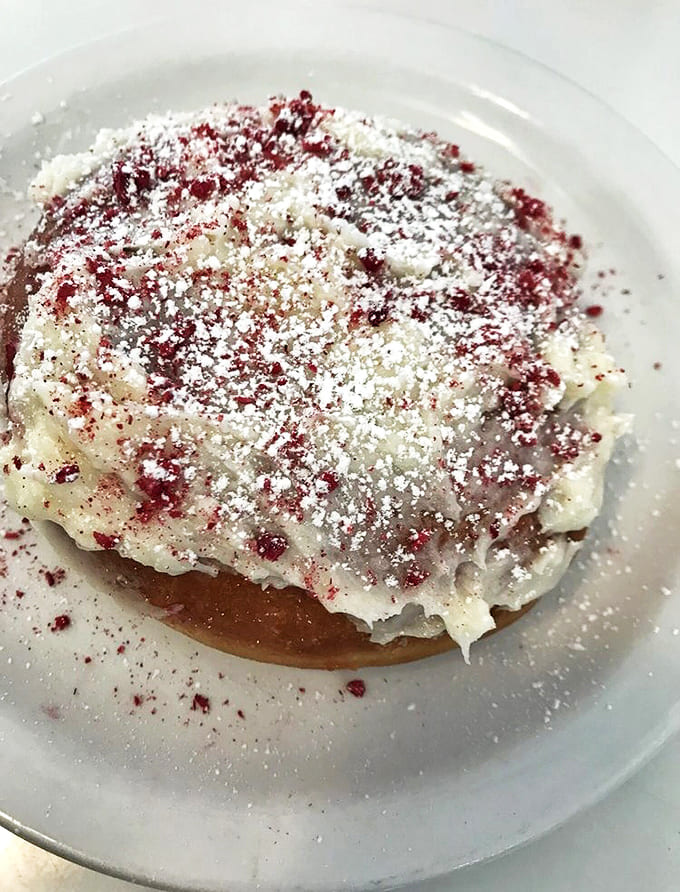 This raspberry-dusted beauty isn't just a donut &ndash; it's what happens when pastry chefs dream in technicolor and wake up hungry.