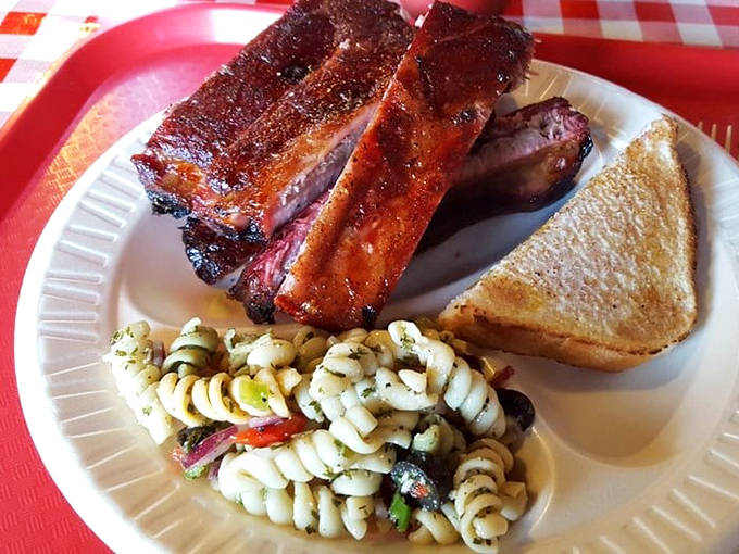 These aren't just ribs; they're edible proof that patience is a virtue. That smoke ring is basically a halo for pork.