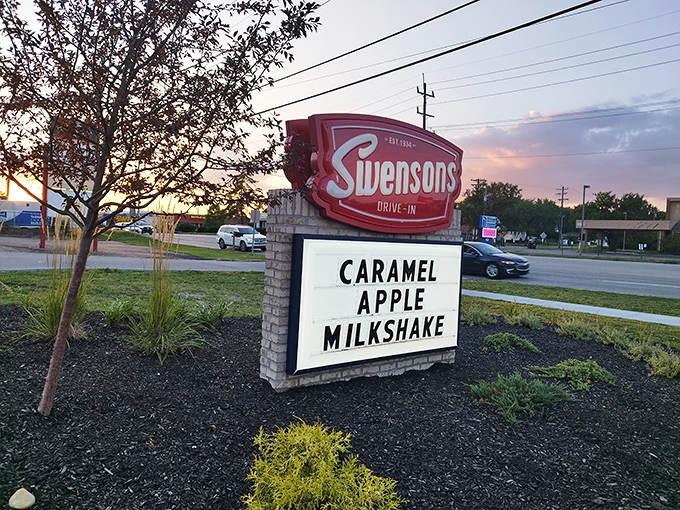 Roadside Sign: Like a beacon for hungry travelers, the Swensons sign announces its seasonal milkshake special &ndash; caramel apple, nature's perfect flavor marriage.
