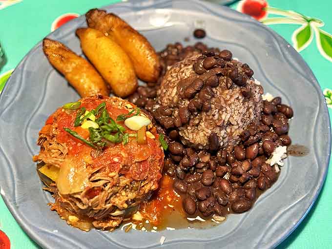 Ropa Vieja &ndash; shredded beef so tender it practically surrenders to your fork, swimming in a tomato sauce that's been simmering since Castro was in power.