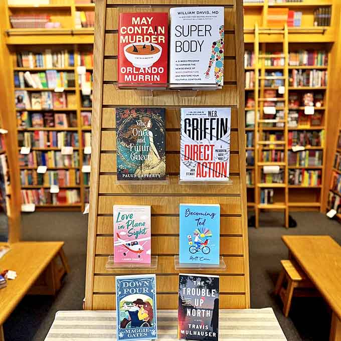 New releases tempt readers from their wooden display stand &ndash; each cover a doorway to different worlds and experiences.