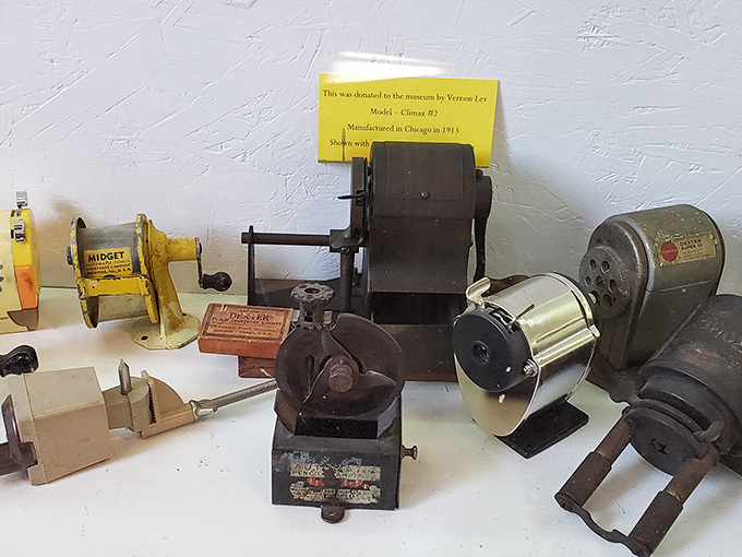 A collection of vintage mechanical sharpeners showcases the surprising evolution of this humble tool through decades of American innovation.