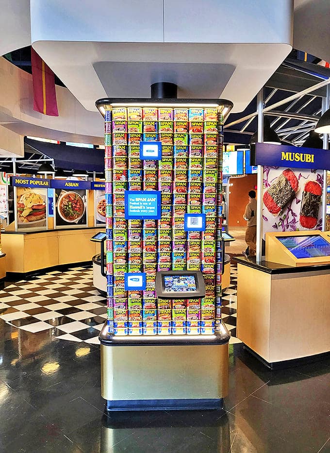 A mesmerizing wall of colorful SPAM&reg; cans creates a cathedral-like atmosphere &ndash; part grocery store, part art installation, entirely dedicated to preserved pork products.