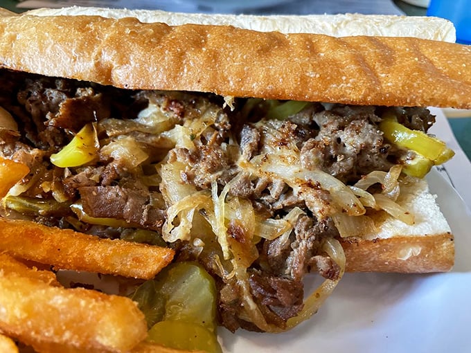 This Philly cheesesteak sandwich isn't messing around &ndash; packed with savory beef, melted cheese, and served with golden fries.