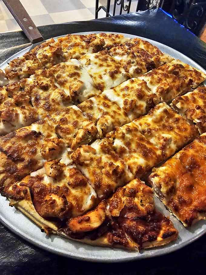 This thin-crust sausage pizza achieves the perfect balance of crispy and chewy, with evenly distributed toppings that create flavor harmony in every bite.