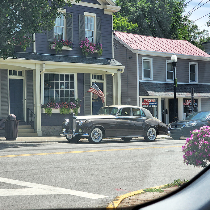 This vintage beauty parked outside a flower-adorned storefront isn't a museum piece &ndash; it's just another Tuesday in Milford's living history.