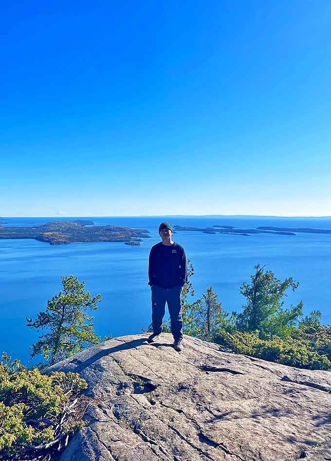 Standing at the edge of Minnesota's magnificence, where selfies are mandatory and cell service is gloriously spotty.